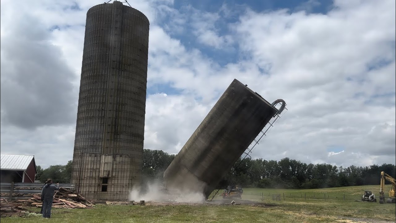 Tearing down the first of two silos - YouTube