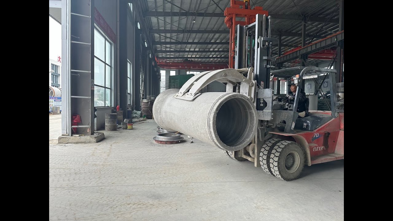 Concrete Pipe Rotation Clamping Device with Forklift - YouTube