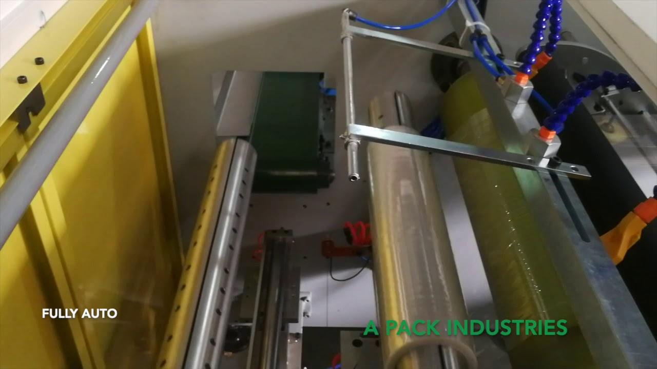 Coreless stretch film rewind machine - YouTube