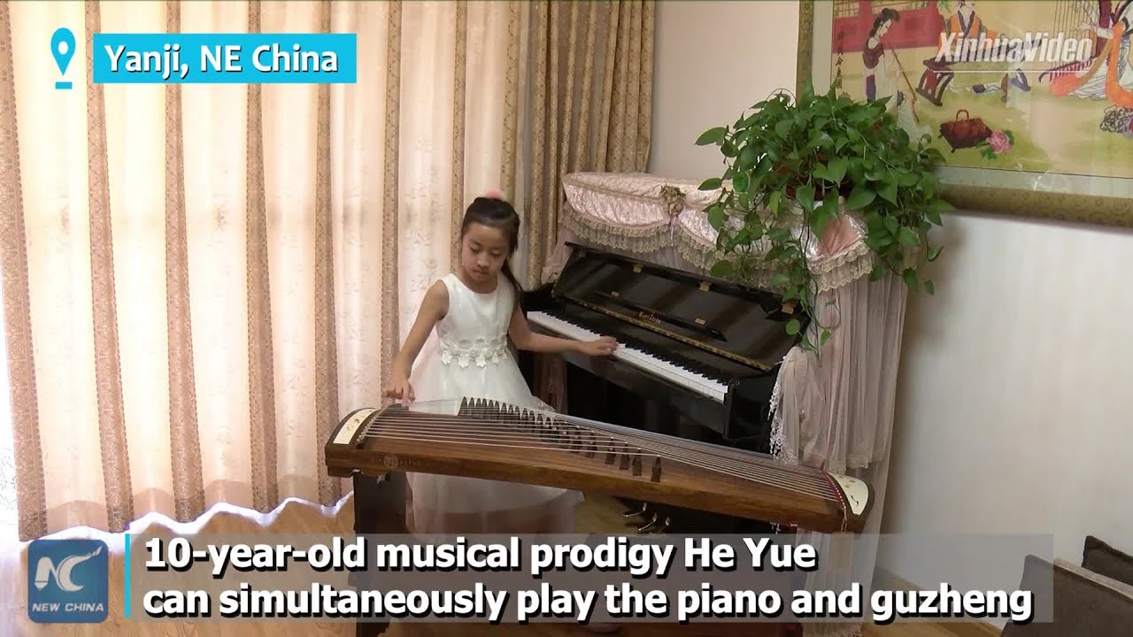 10-year-old Chinese prodigy simultaneously plays piano and guzheng ...