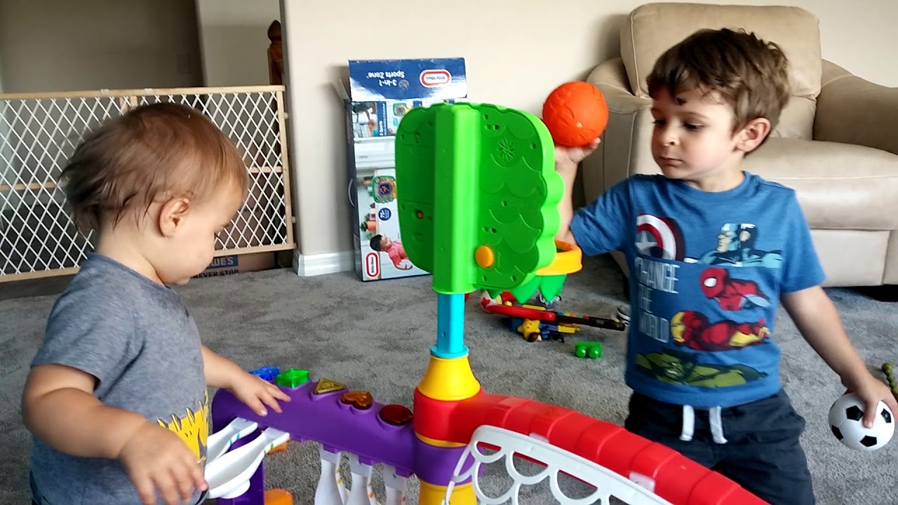 Matthew and Andrew playing with Matthew's new toy - YouTube