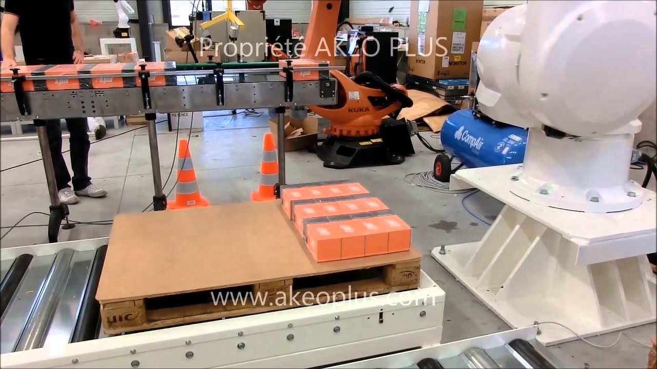 Cellule de palettisation avec caisson à vide MVG COVAL - YouTube