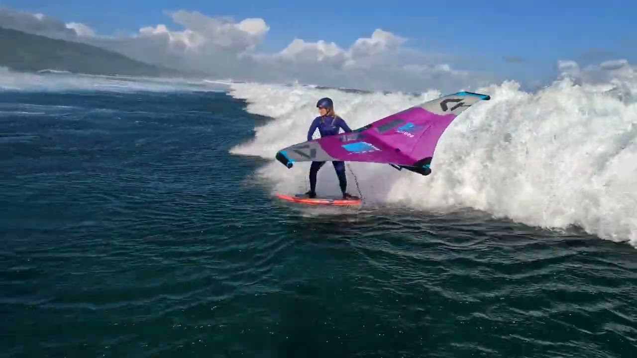 Wing foiler and white water - YouTube