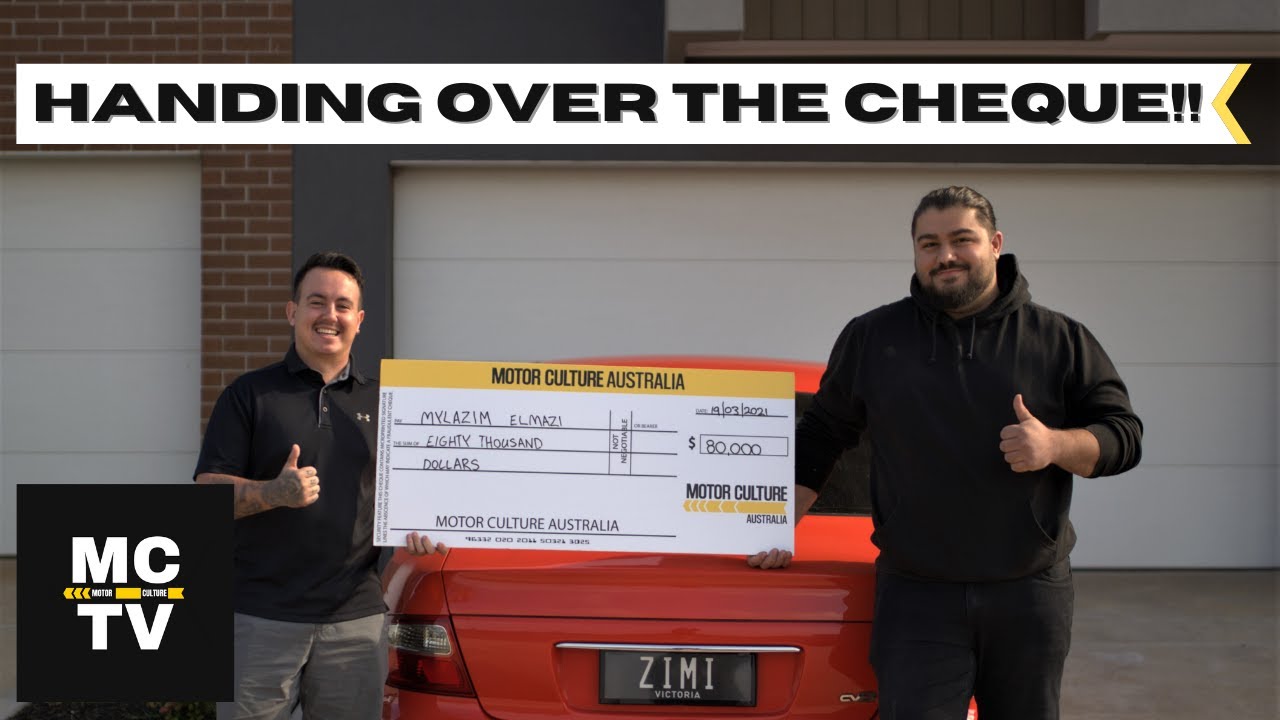 Handing over the cheque to our winner in Melbourne!!!! - YouTube