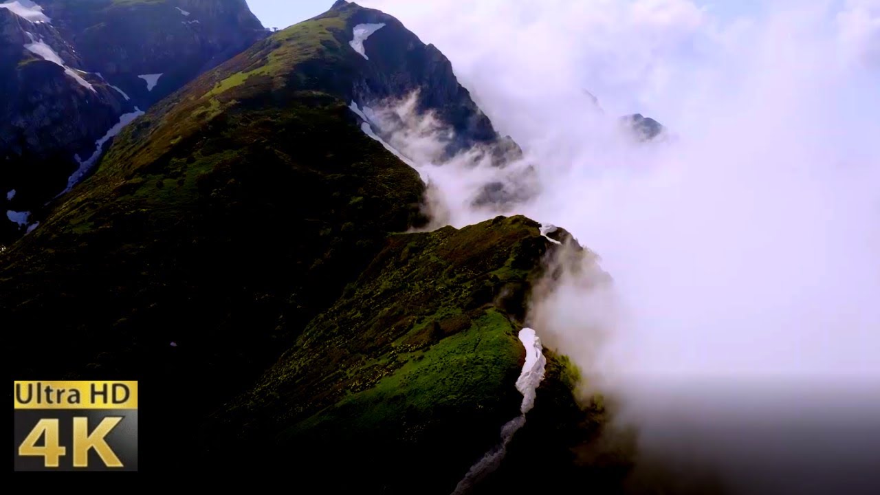 4K Drone Footage - Clouds Touches The Ground Of Mountains - YouTube