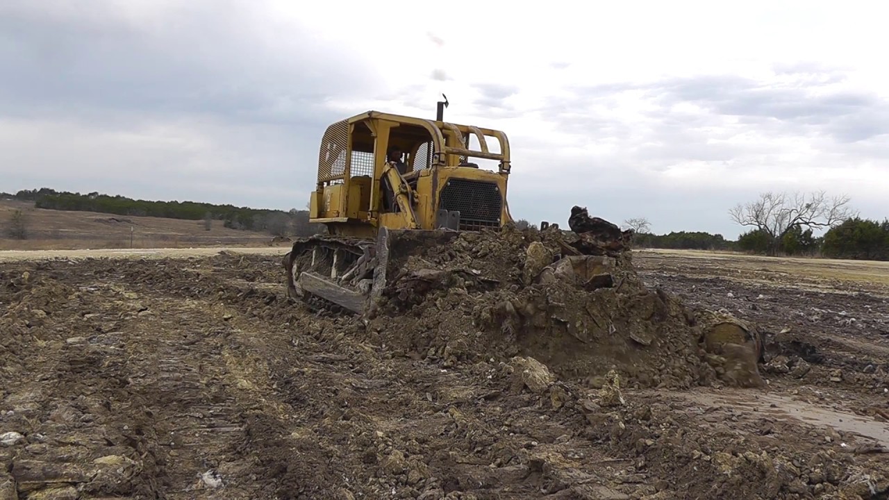 Pushing Trash With CAT D7E Bulldozer - YouTube