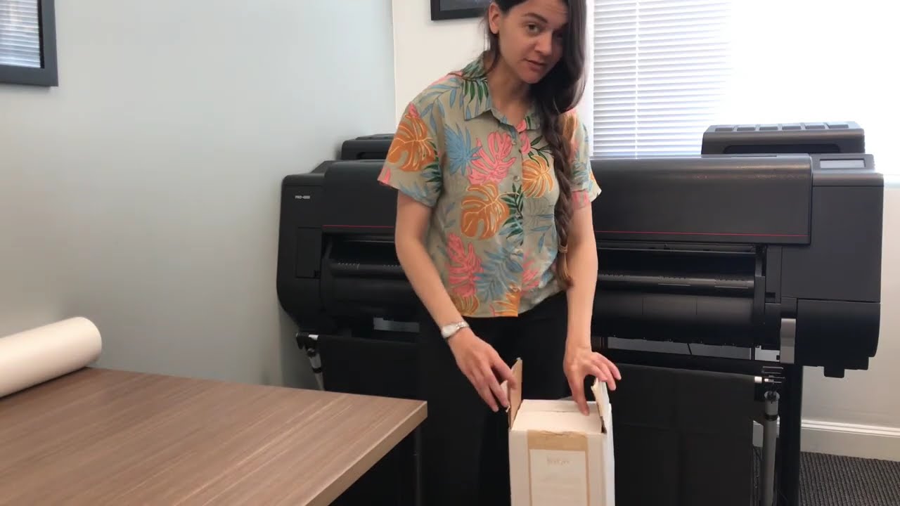 HOW TO LOAD A PAPER ROLL INTO THE CANON IMAGEPROGRAF 4100 - YouTube