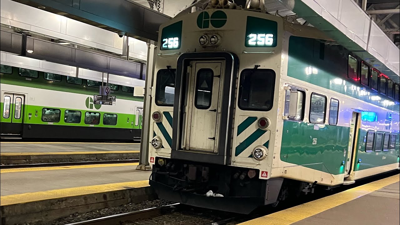GO Trains At Night At Toronto Union Station Featuring Old Cab Car #256 ...