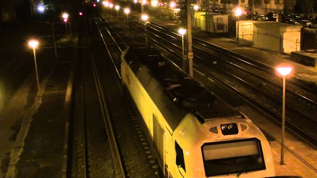 Renfe 334 saliendo con Trenhotel Irún - Lisboa - YouTube