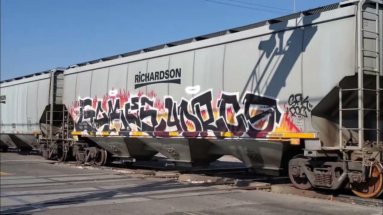 SJVR 2406 + 2409 grainer train passing Sunmaid Diamond Fresno ca - YouTube