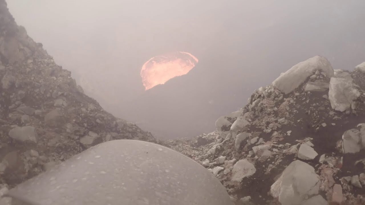 Near Miss Inside Erupting Volcano - Dangerous Rock Fall - YouTube