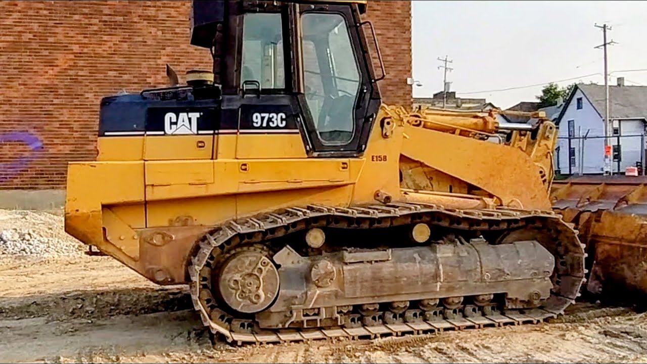 Road Construction Ahead - CAT 973C - YouTube