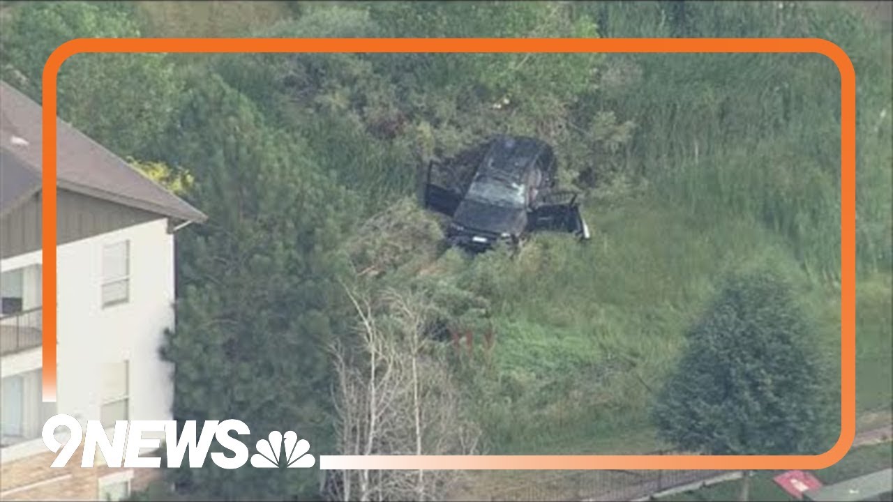 Car runs off road in Aurora - YouTube