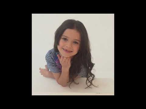 Kids Model Tests Backstage. Very Beautiful Little Girl