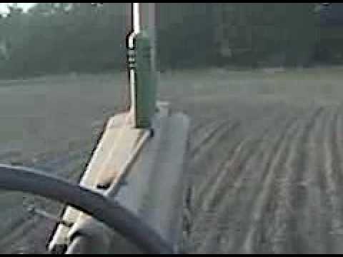 JOHN DEERE A pulling a spring tooth drag - YouTube