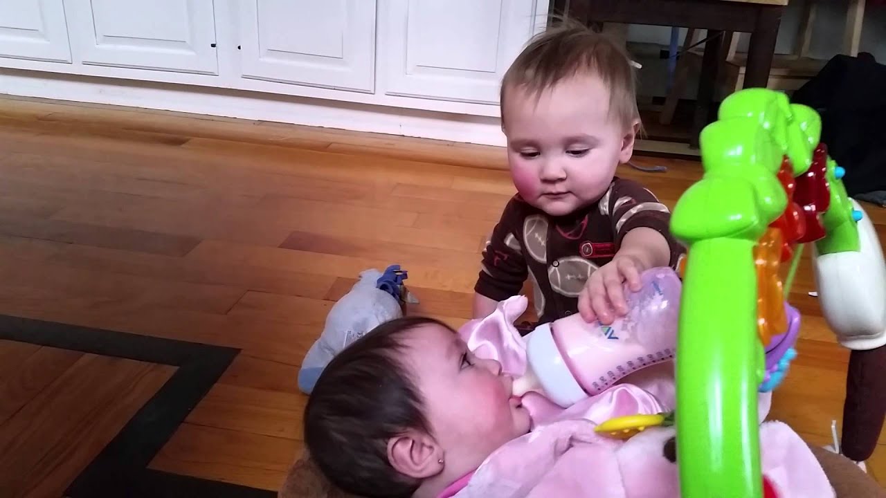 Baby helping baby - YouTube