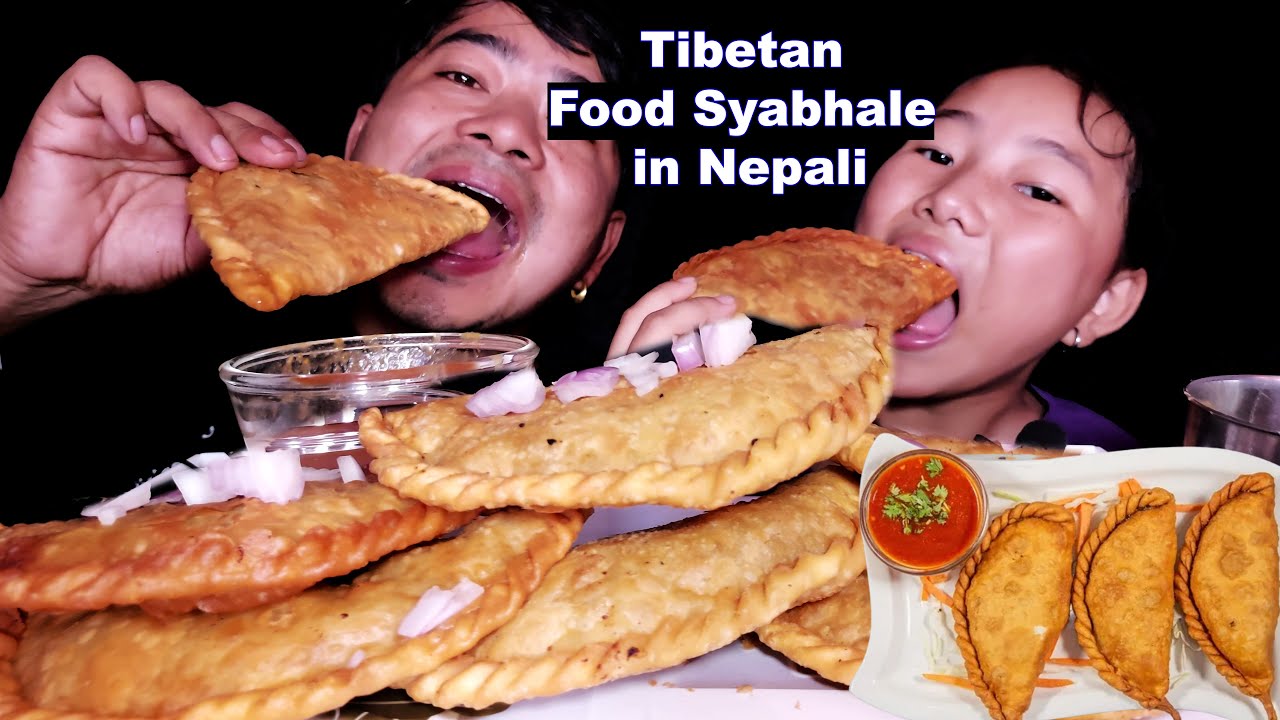 Bhuwan Eats Tibetan Food Shapale 🥟 syabhale achar recipe 🥟 eating show ...