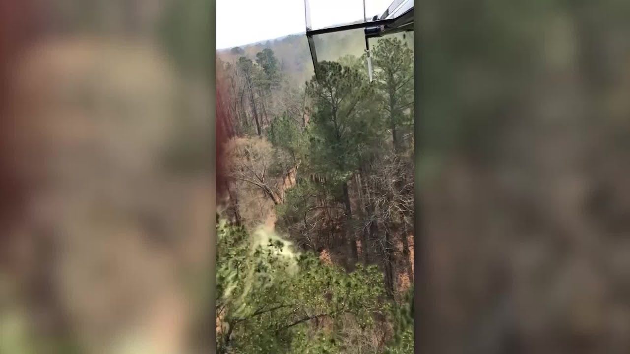 Helicopter stirs up pollen at Georgia, Alabama border - YouTube
