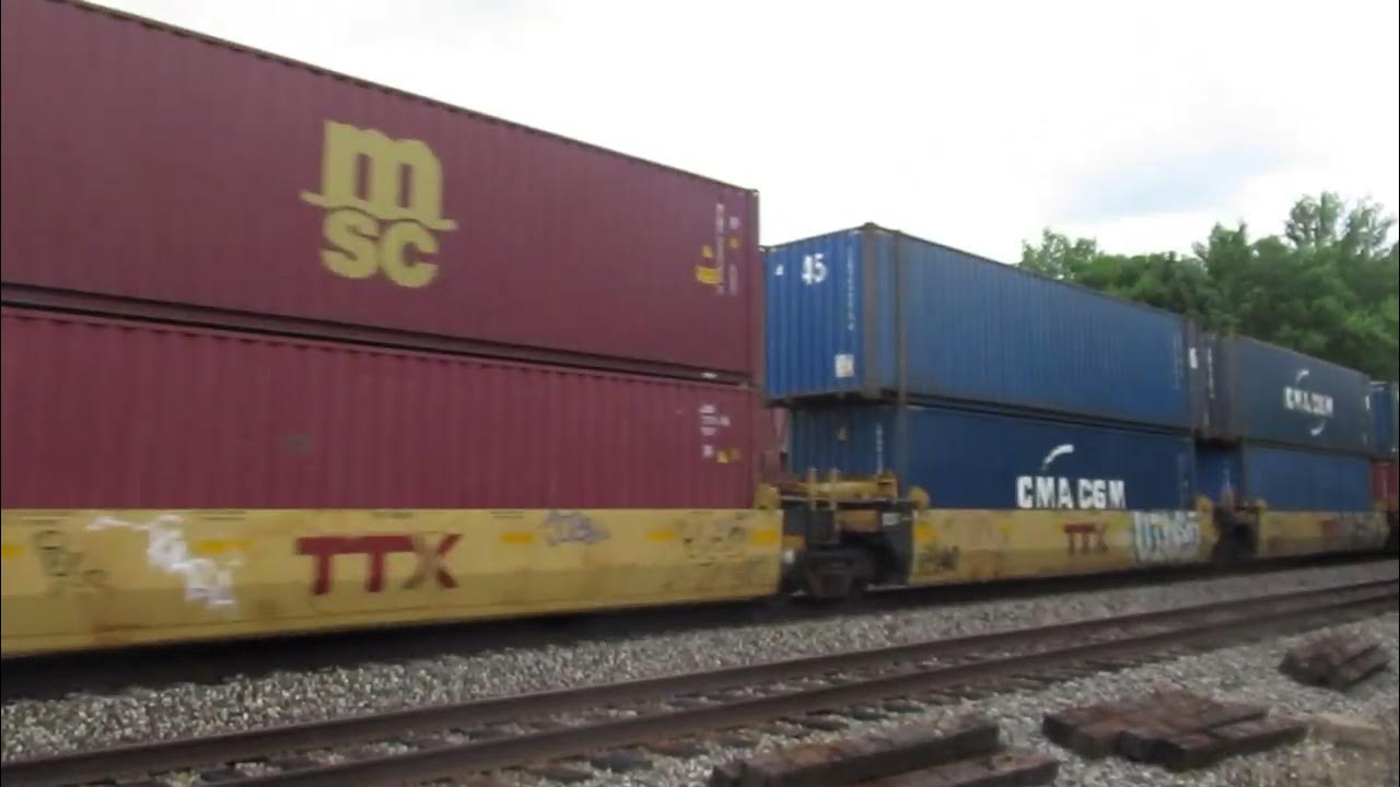 CN 8934, BNSF 7715, 4314, IC 2707 towing a Westbound intermodal container train past Vicksburg ...