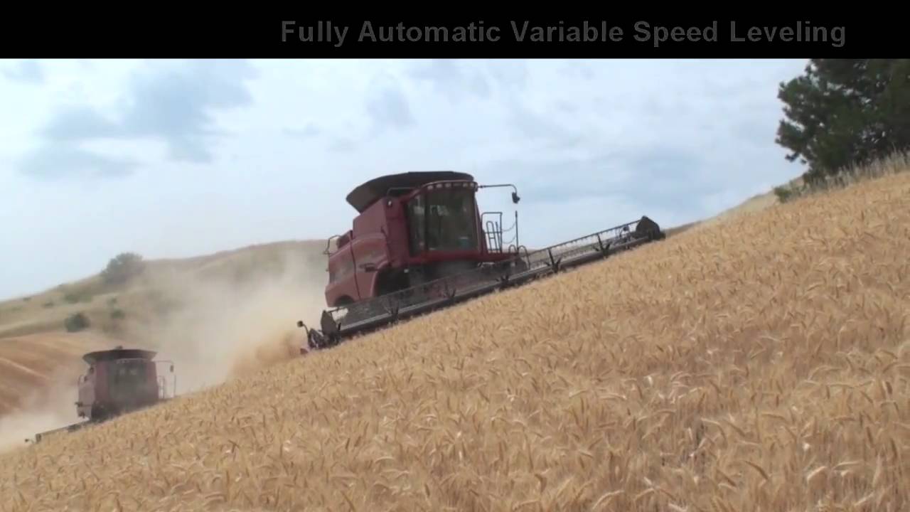Case-IH combine equipped with Hillco Hillside Leveling Systems - YouTube