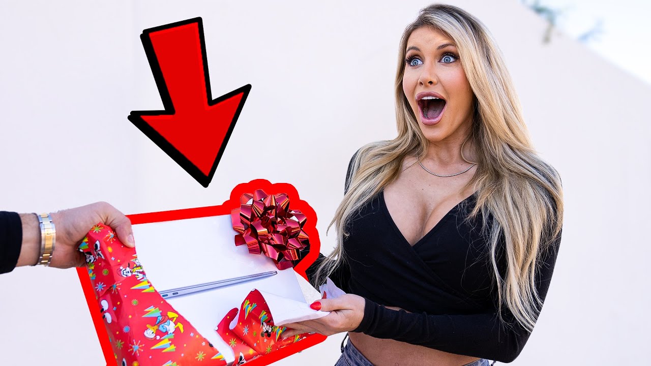 Giving Strangers Expensive Christmas Presents.. - YouTube
