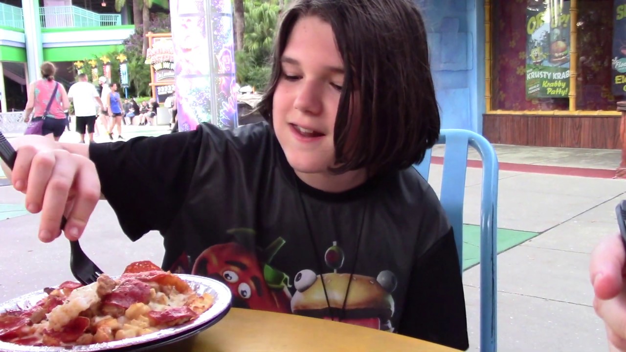 Enjoying some famous pizza fries during Halloween horror night 29 2019 ...
