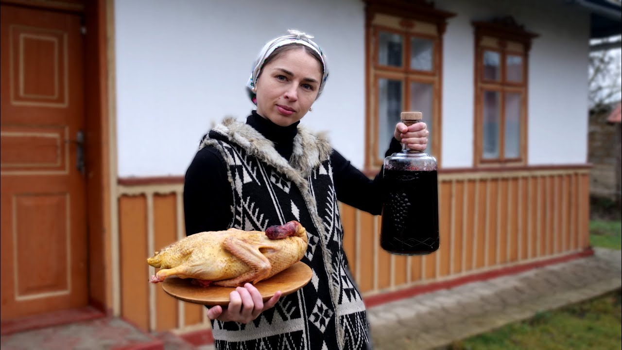 WOMAN lives in the village. Cooking DUCK with berry wine. Simple and ...