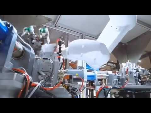 Estun Mini robot material loading and unloading MAI - YouTube