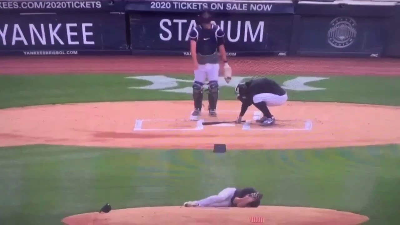 Masahiro Tanaka is hit in the head by a line drive from Giancarlo ...