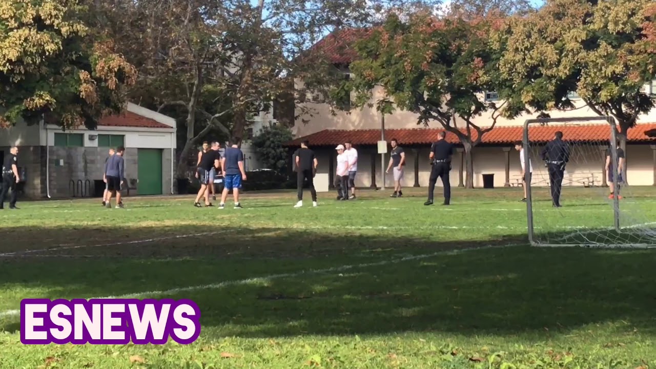 Beverly Hills police playing football in full gear versus guys at the ...