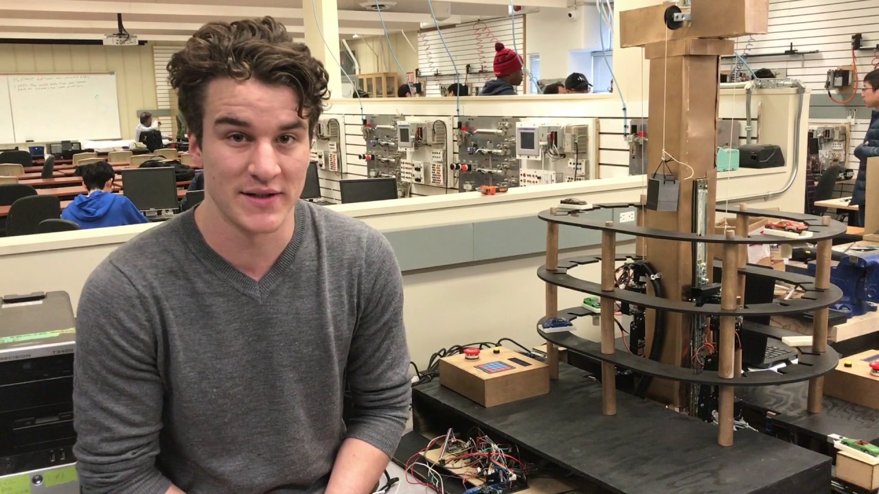 Multi-level Parking Garage Automated System project with 2 robotic arms ...