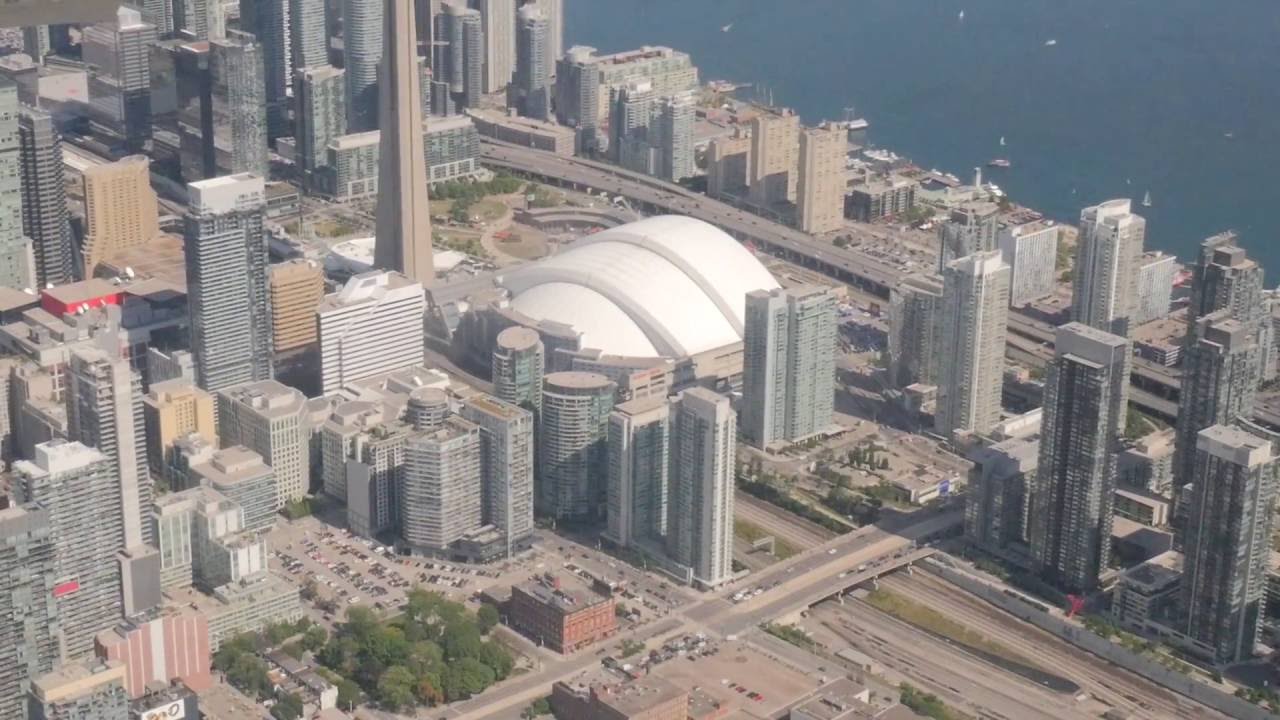 Circling the CN Tower in a Private Plane Flying Over Toronto - YouTube