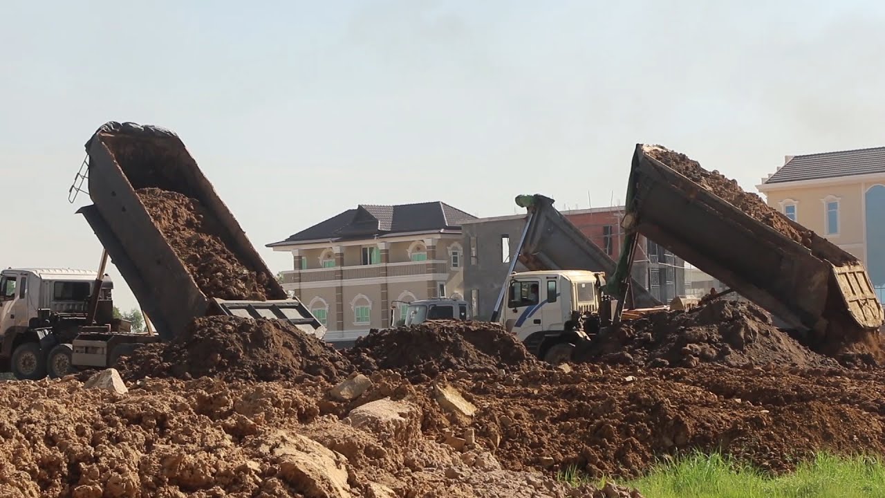 Land filling equipment heavy loading truck and bulldozer - YouTube