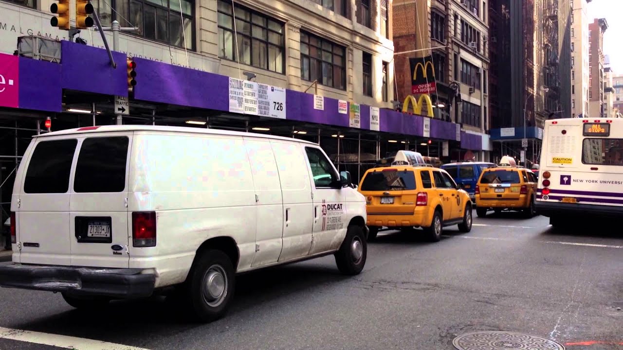 NYU Shuttle Academy Bus NovaBus LFS 2120 On Route E At Broadway nyu-shuttle-academy-bus-novabus-lfs-2120-on-route-e-at-broadway