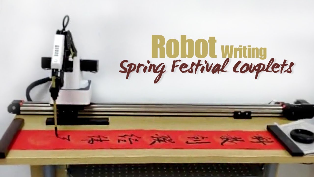Robots show calligraphy skill by writing Spring Festival couplets in E ...