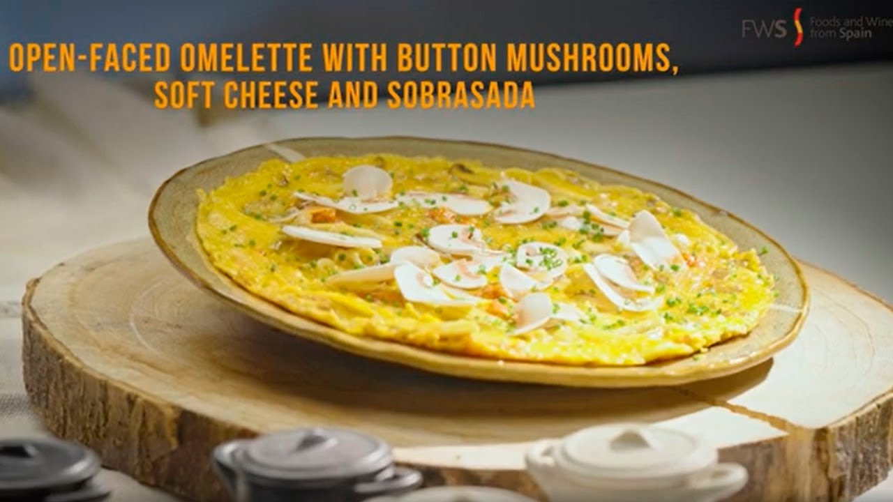 Spanish recipe: Open-Faced Omelette with button mushrooms, soft cheese ...