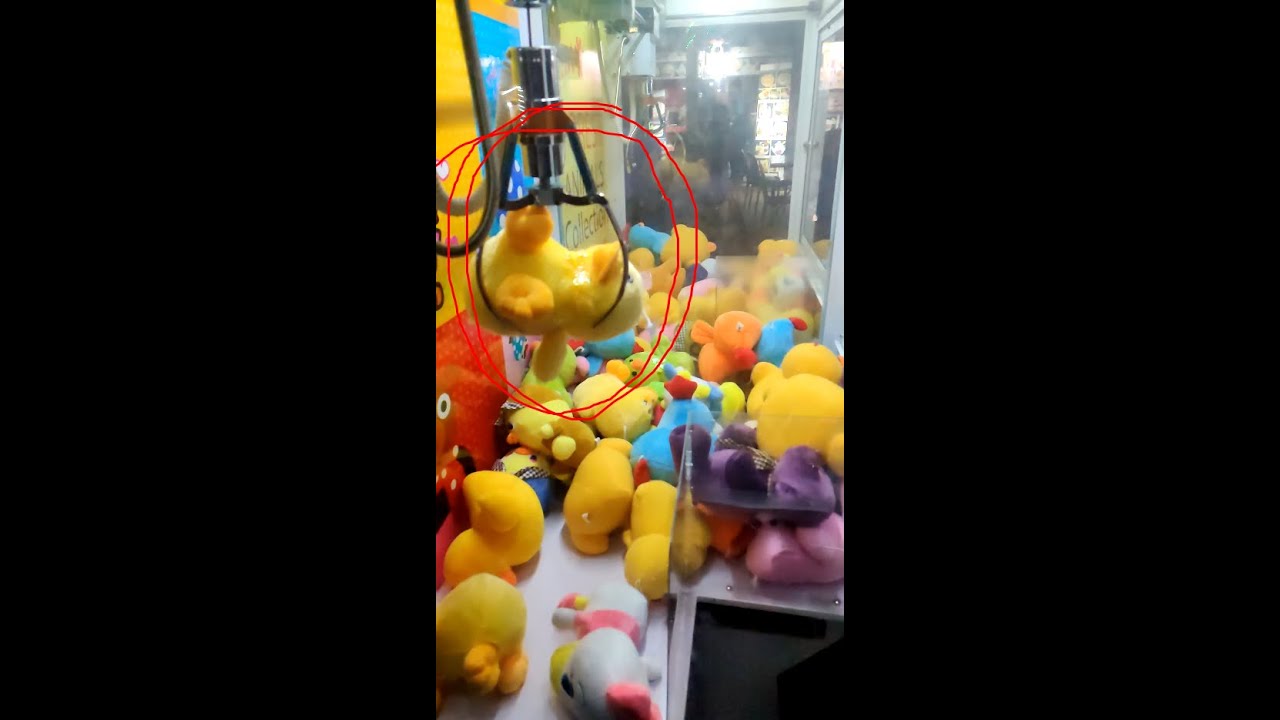All Claw Machines are rigged!! It a scam see in slow motion - YouTube