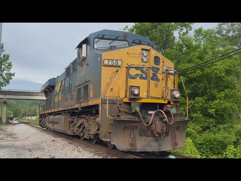CSX 758 leads a train with a shiny rebuild and a supposed “AC” powered CSX DC GEVO. - YouTube