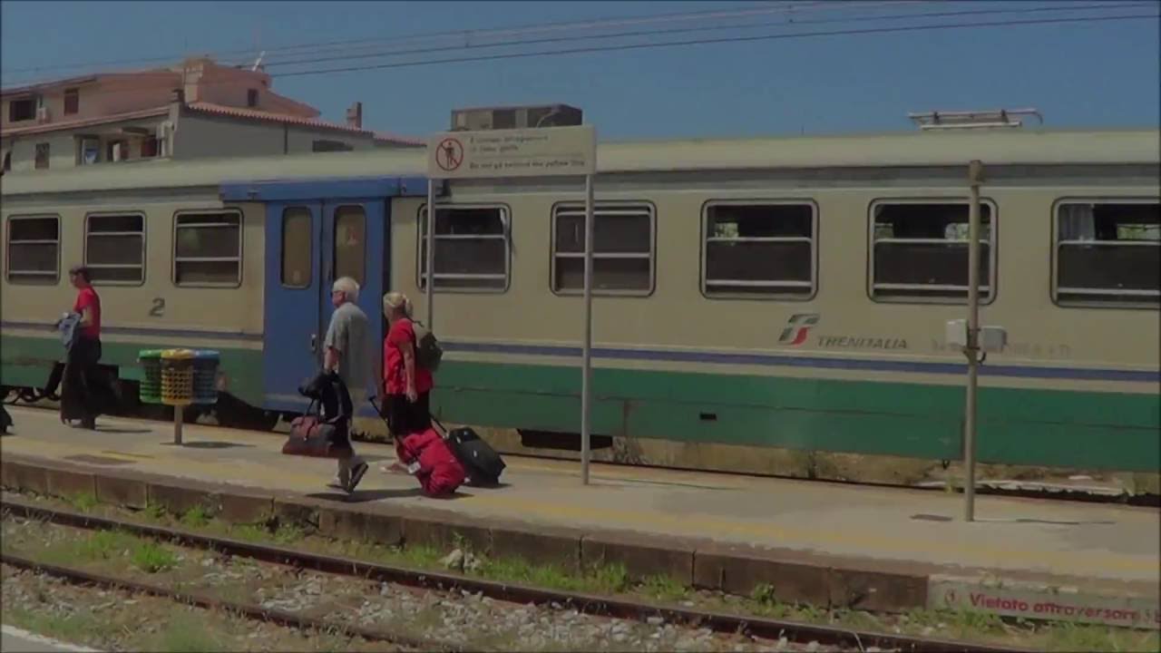Trenitalia train departing Tropea Railway Station in Italy 04/08/2016 ...