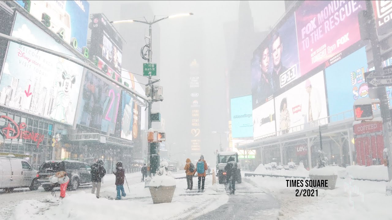 Snow scenes from Times Square New York City. 2021 Northeast snowstorm ...