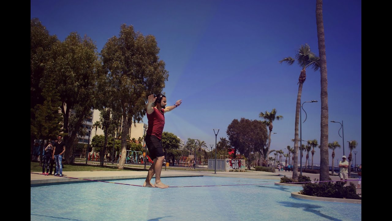 Gibbon Surfer Slackline over the pool - YouTube