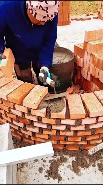 process of building a circular brick wall #shorts - YouTube