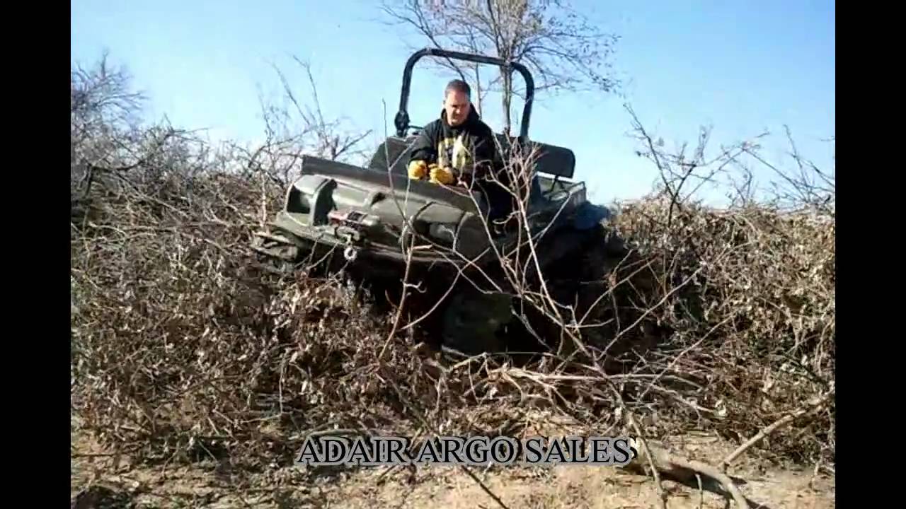MUDD-OX 8X8 WITH ADAIR ARGO TRACKS BRUSH PILE.avi - YouTube