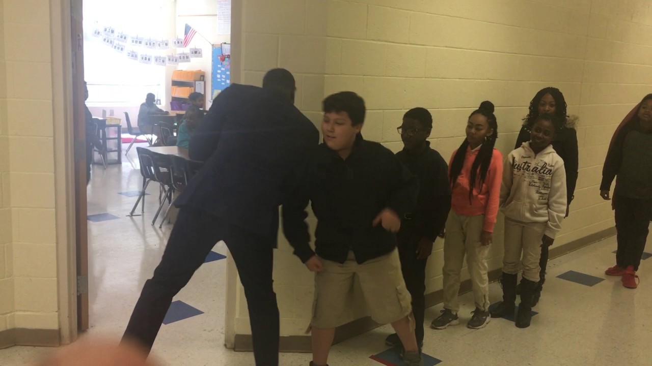 Teacher creates personalized handshakes for all his students - YouTube