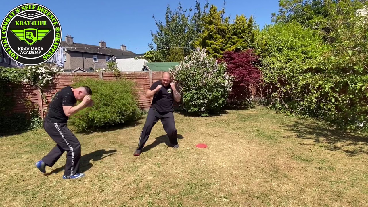 Defending high roundhouse kick, two handed block - YouTube