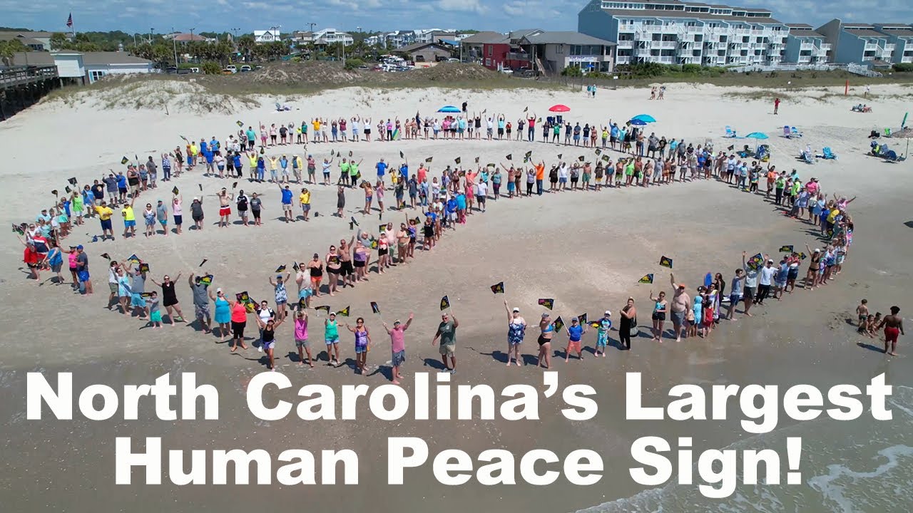 Human Peace Sign on Ocean Isle Beach - YouTube