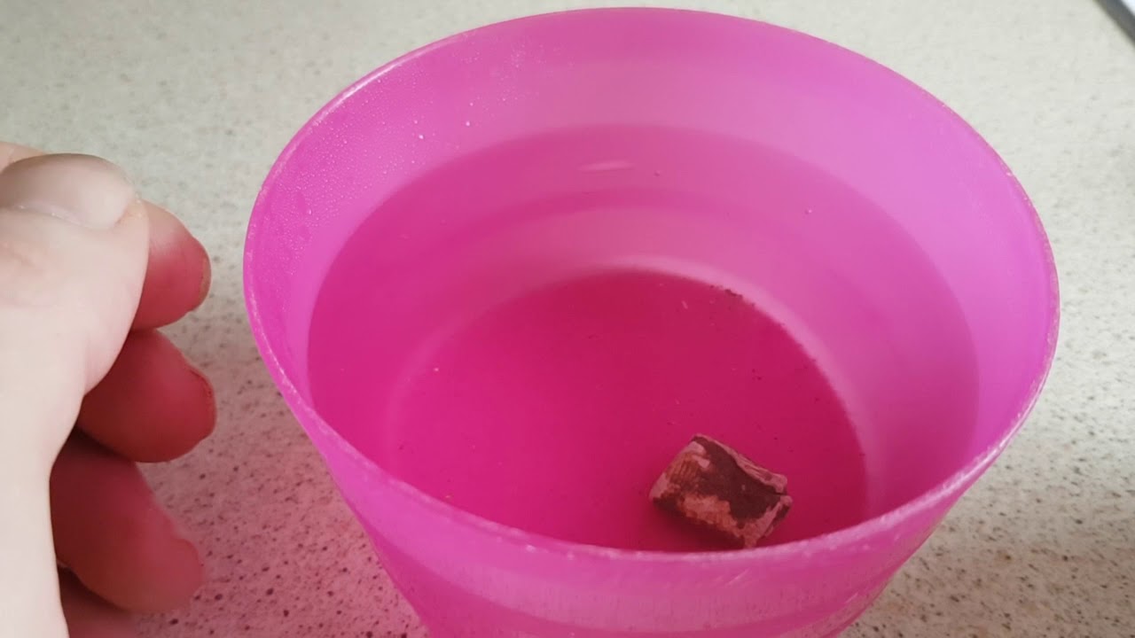 Unrolling a Roman curse lead roll - YouTube