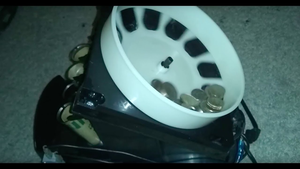 Inside a coin sorter - YouTube