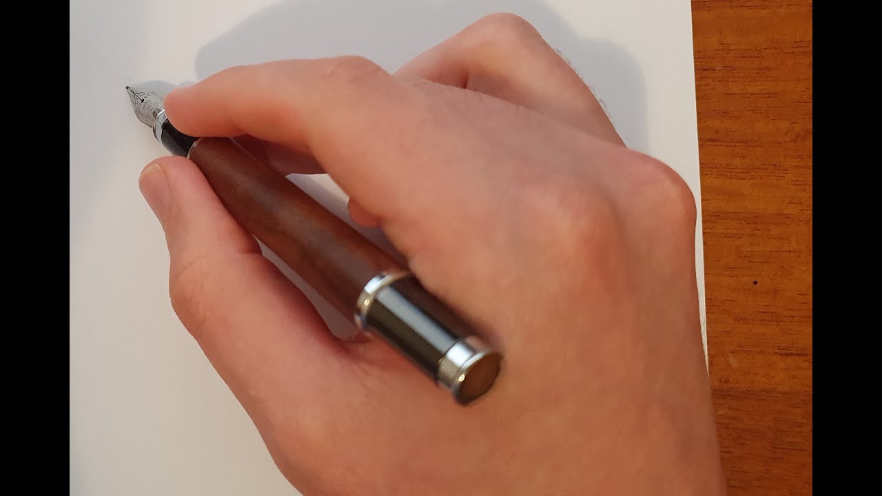 Managing writing related thumb and wrist pain for students - YouTube