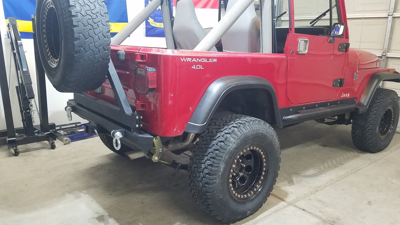 Lifting the Rear and Mounting a Spare on the YJ - YouTube